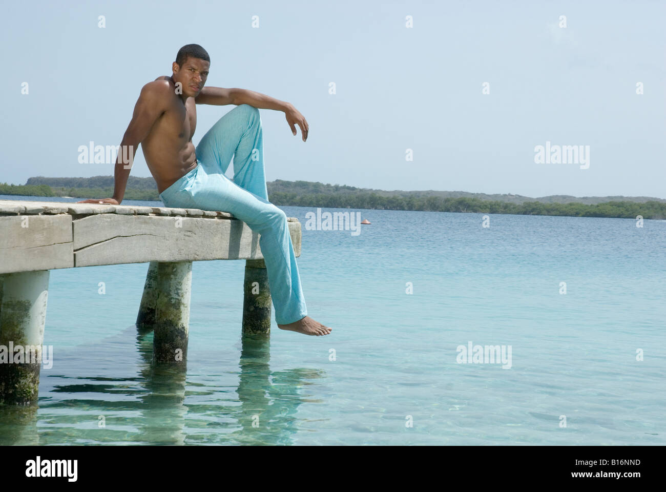 Man Sitting On Dock High Resolution Stock Photography and Images - Alamy