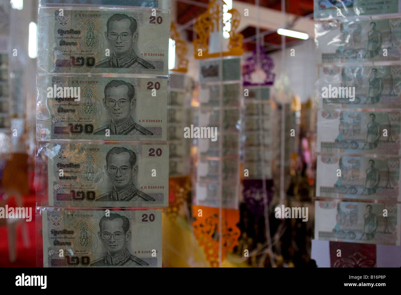 Religious Money offering hanging inside a buddhist temple in Chiang Mai ...