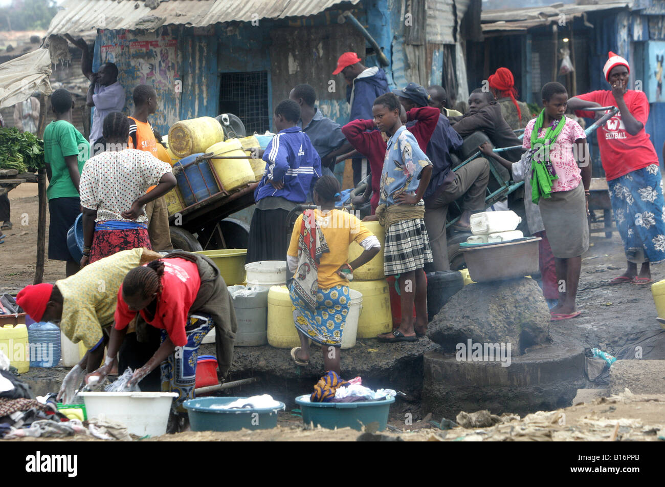Kenya: women washing at a watering place in the slum Mathare Valley in ...