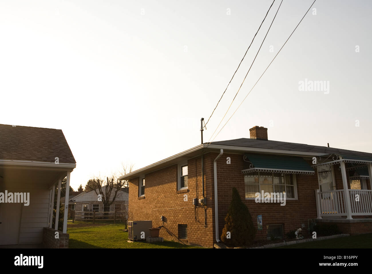 A house with telephone wires Stock Photo - Alamy
