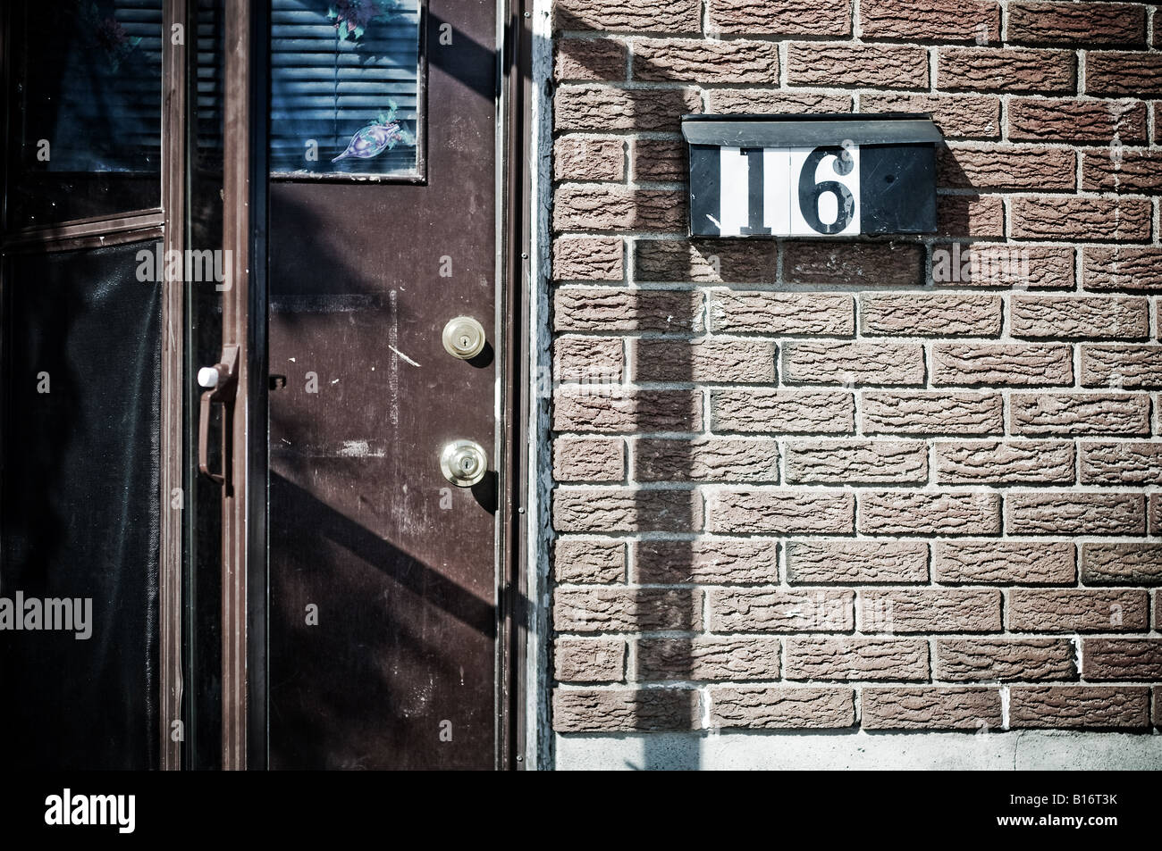 The decrepid exterior of a low income housing building Stock Photo - Alamy
