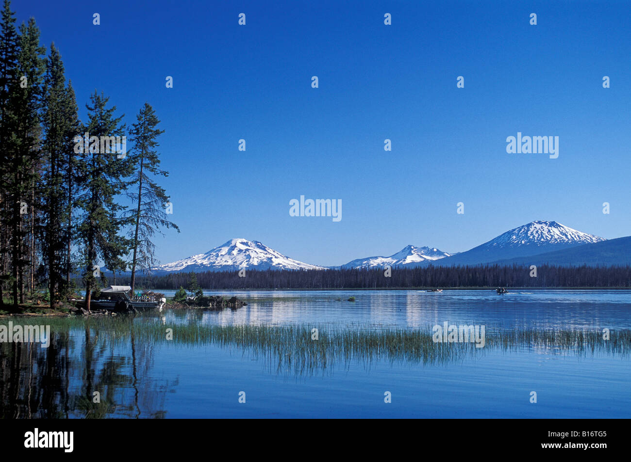 Crane Prairie Reservoir with South Sister Broken Top and Mount Bachelor ...
