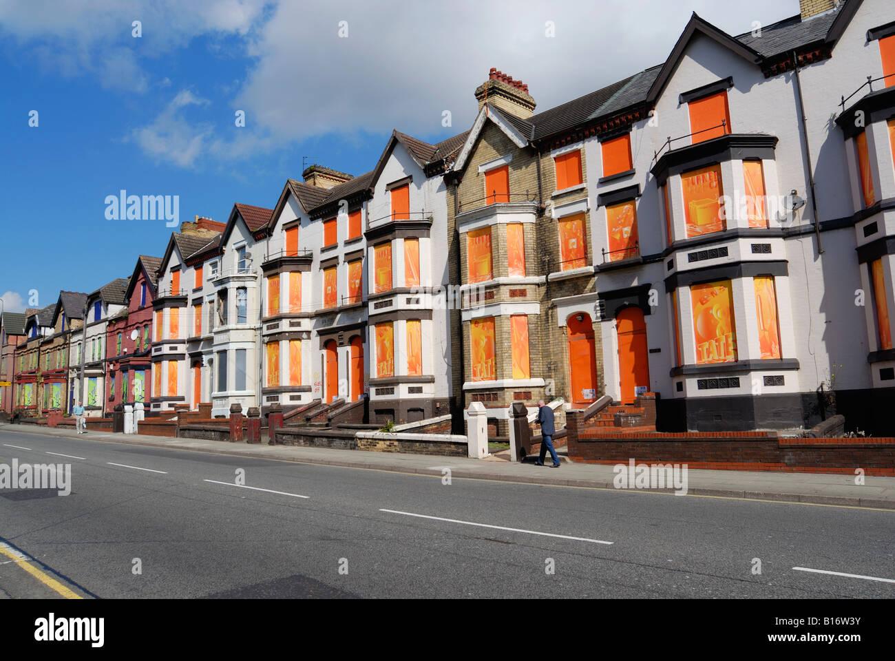 Housing on Edge Lane in Liverpool boarded up with colorful artwork in ...