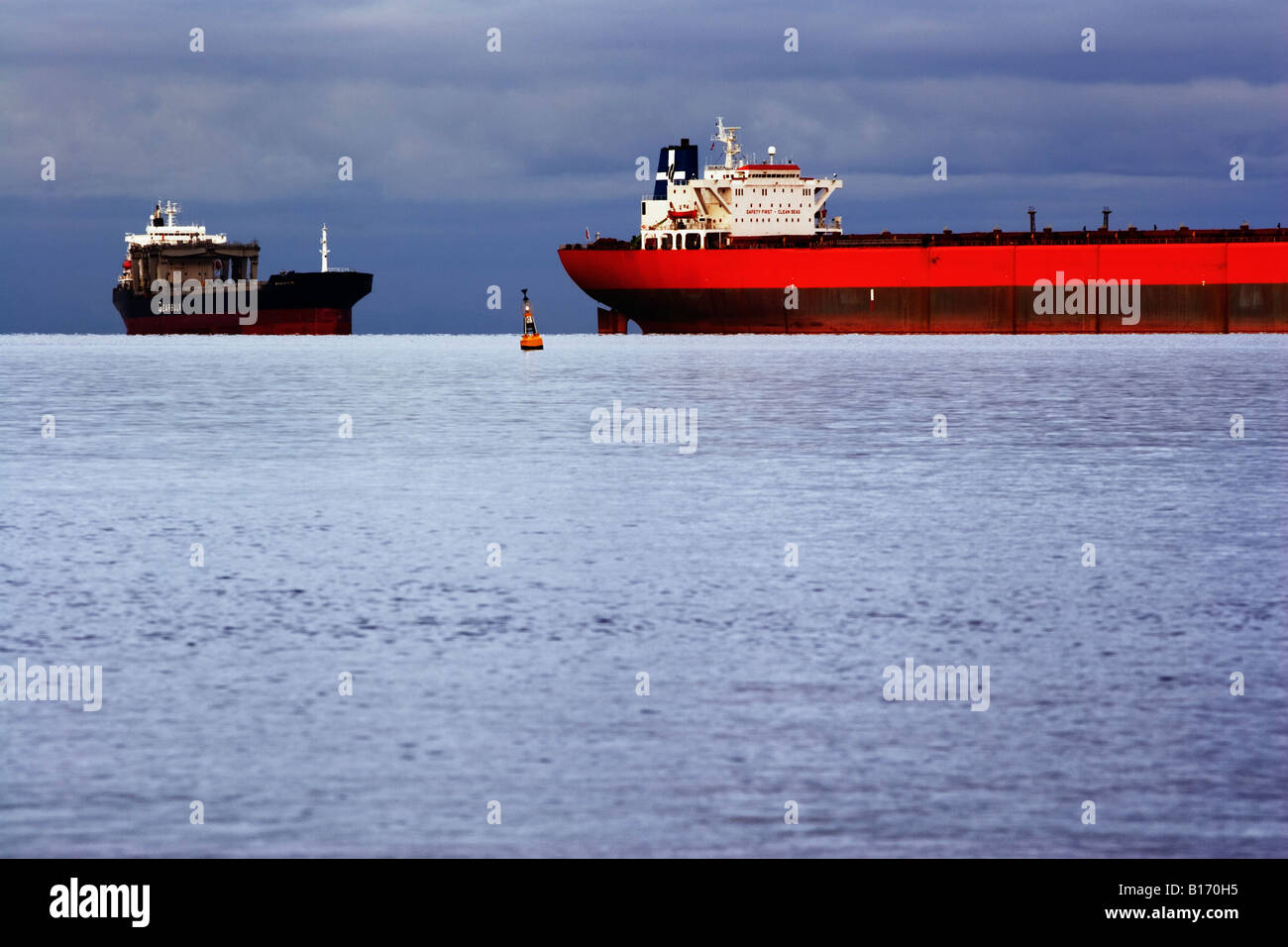 two cargo boats waiting at anchor vancouver british columbia Stock ...