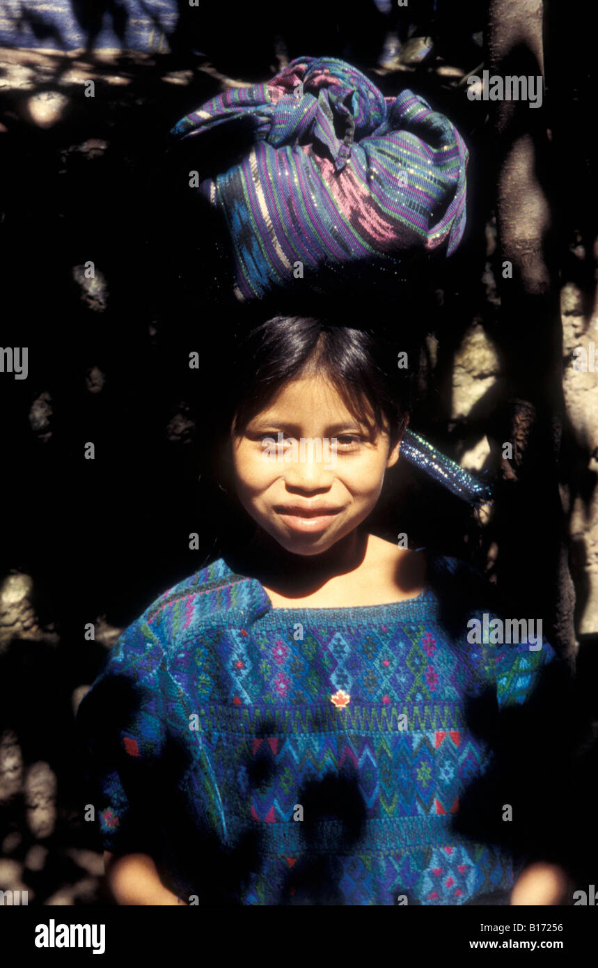 Young Maya girl wearing traditional Mayan clothing, Antigua, Guatemala ...
