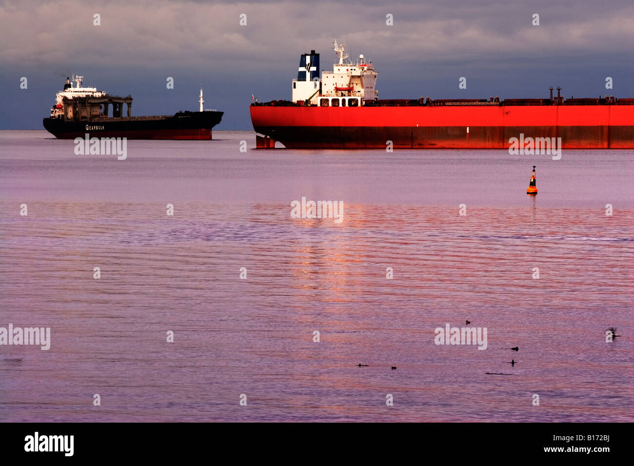 two cargo boats waiting at anchor vancouver british columbia Stock ...