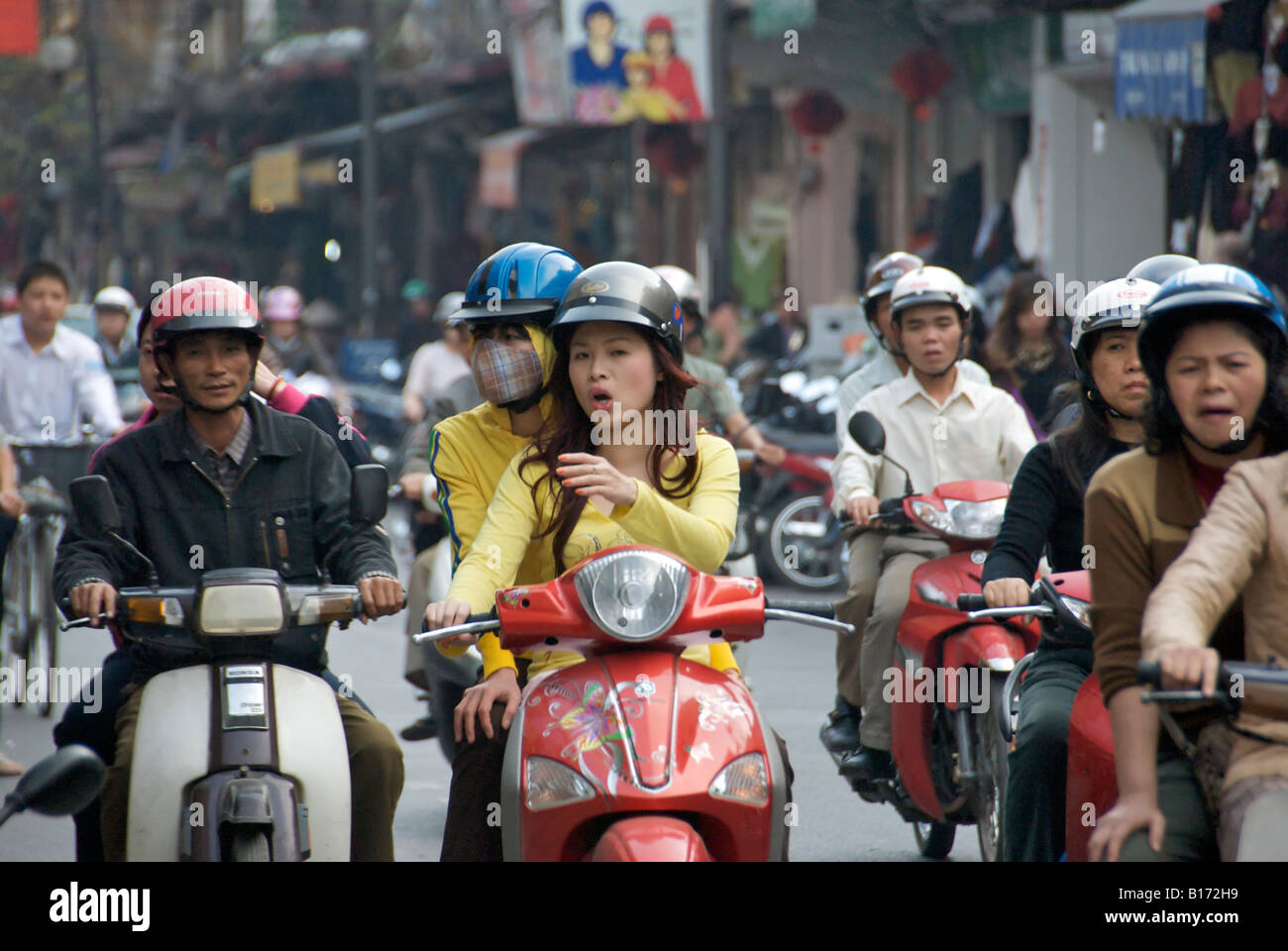 Motor scooters crowded street Old Quarter Hanoi Vietnam Stock Photo - Alamy
