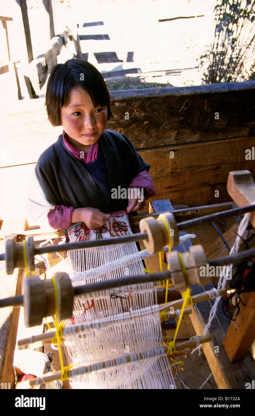 Bhutan Zungney crafts textiles girl hand weaving woolen cloth Stock ...
