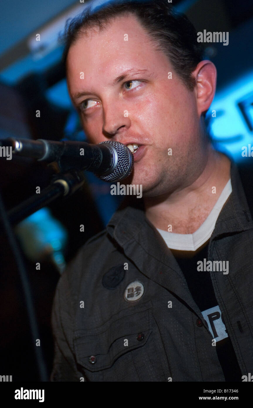 Rock band vocalist Stock Photo - Alamy