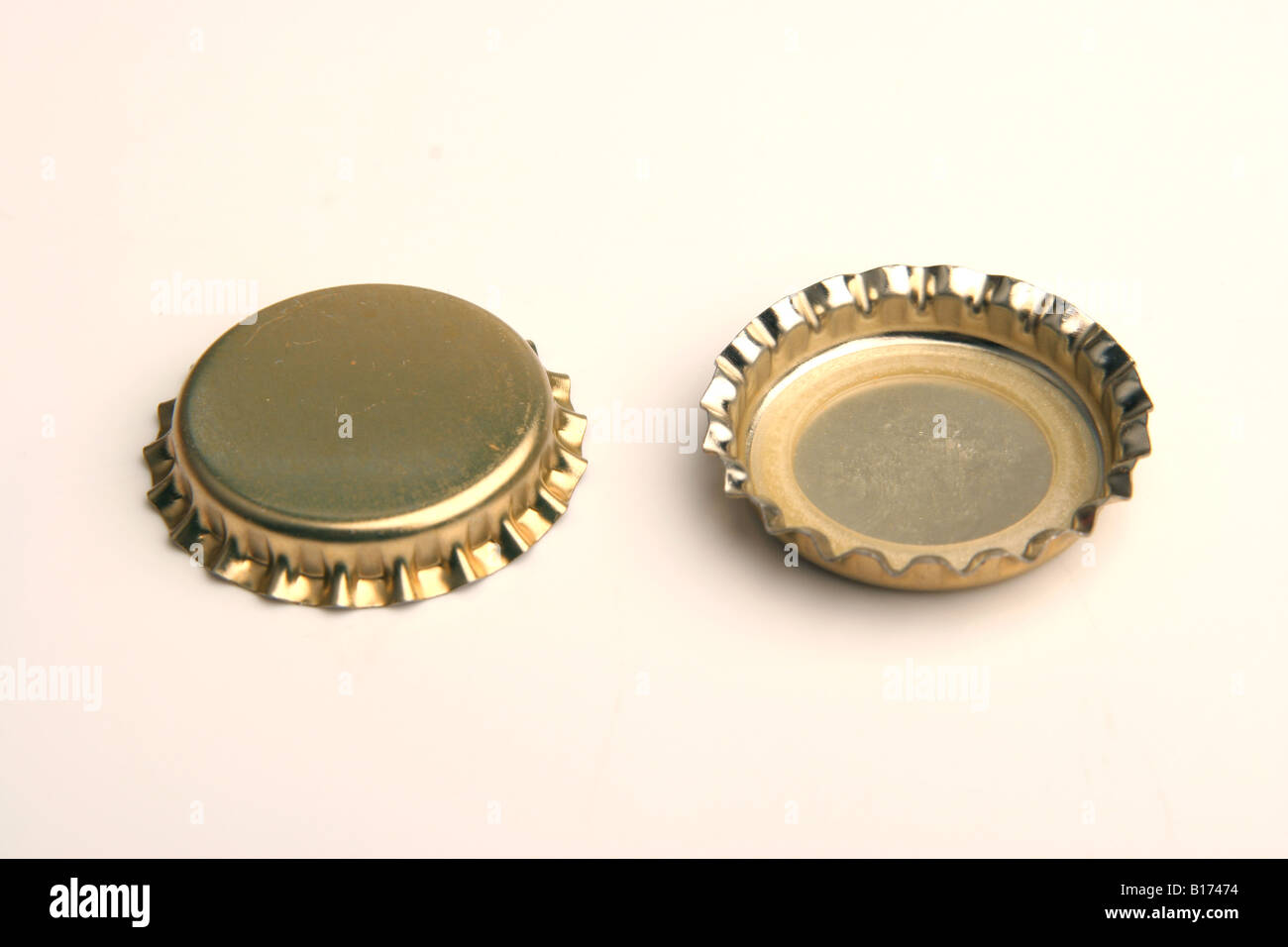 Golden bottle caps Stock Photo - Alamy