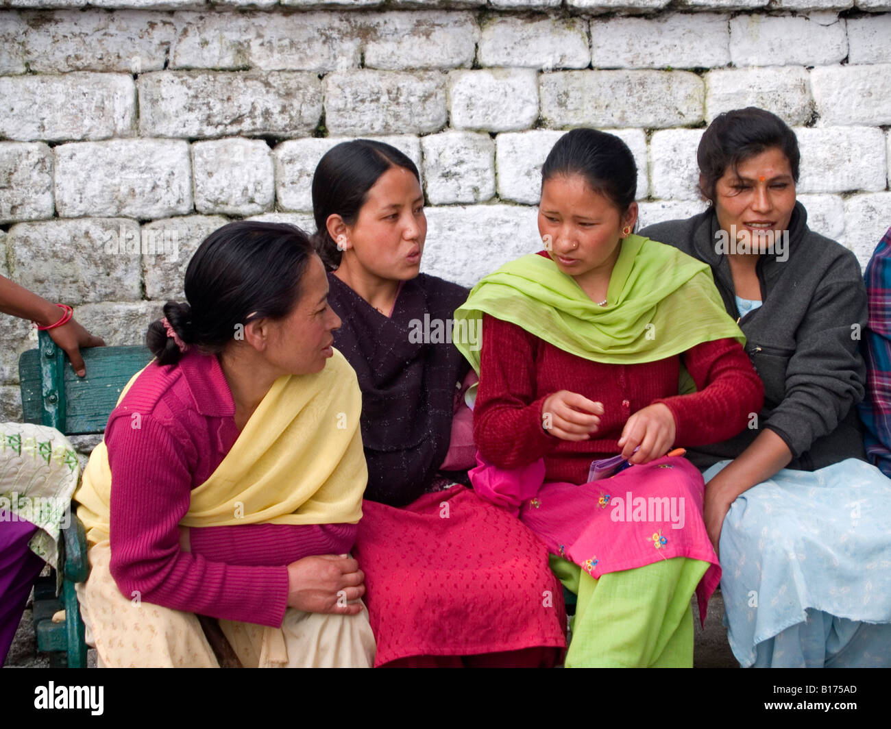 Nepali women sitting on a bench in Darjeeling Stock Photo - Alamy