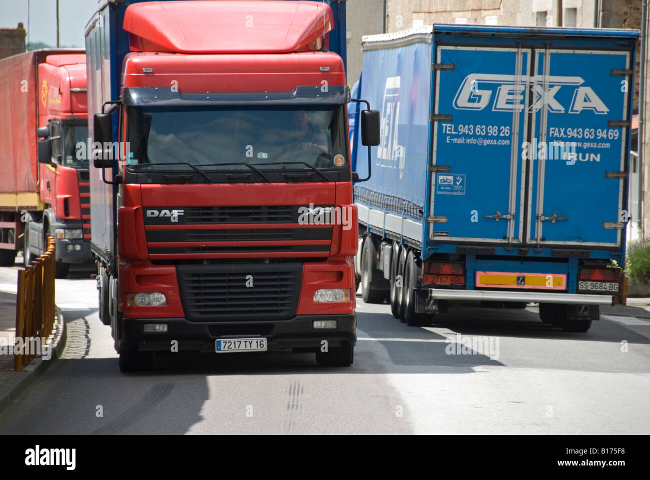 Stock photo of two articulated lorries passing each other as they ...