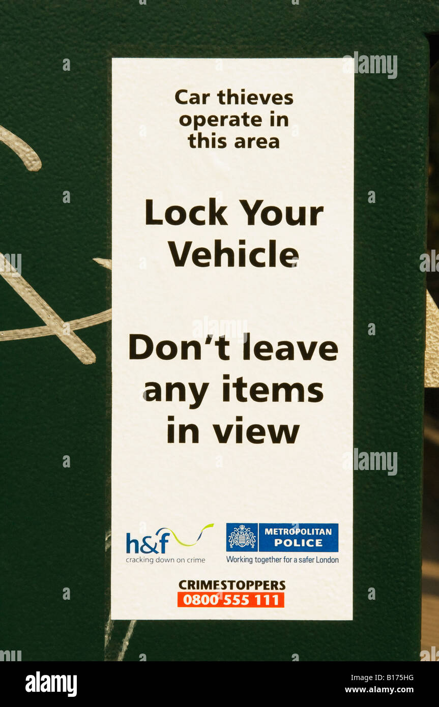 Sign warning car theft thieves hi-res stock photography and images - Alamy
