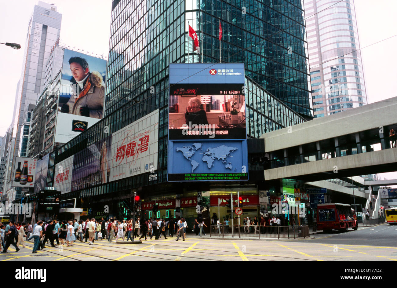 Public television screen on Worldwide House broadcasting news and stock ...