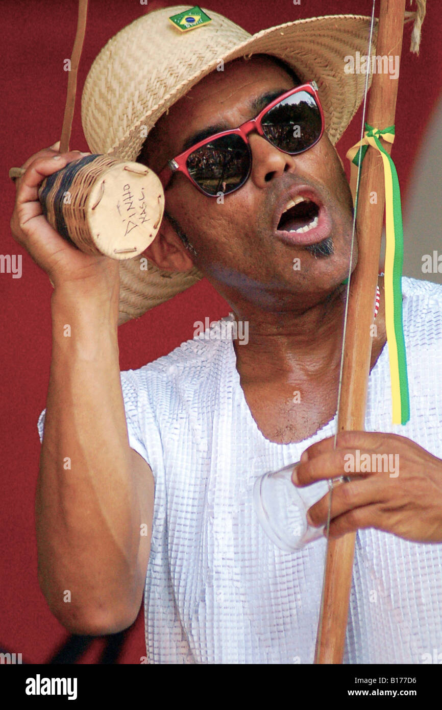 A Brazilian musician entertains the Samba-loving crowds at a music ...