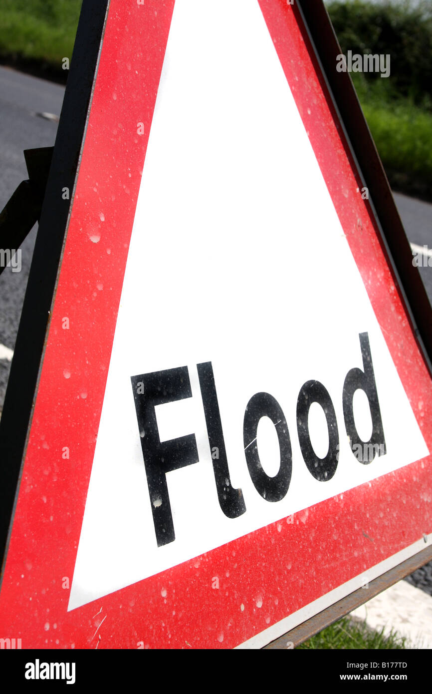 A flood warning road sign Stock Photo - Alamy