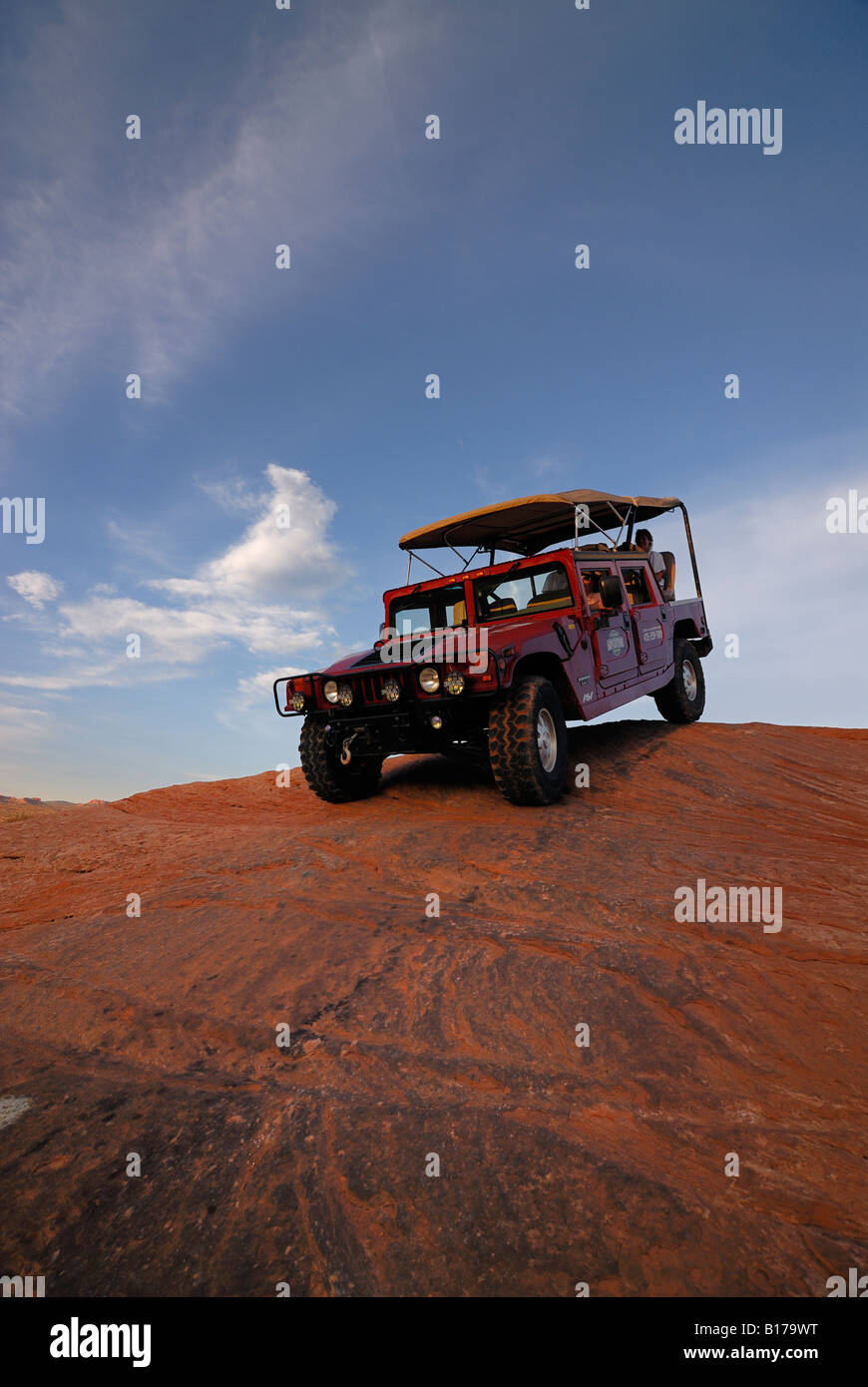 Hummer jeep on the slick rock trail at sunset Moab Utah USA MR Stock ...