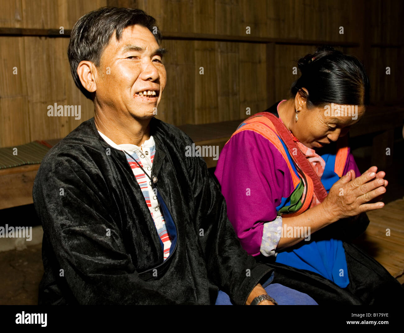 a married couple from the Akha tribe in the village catering house ...