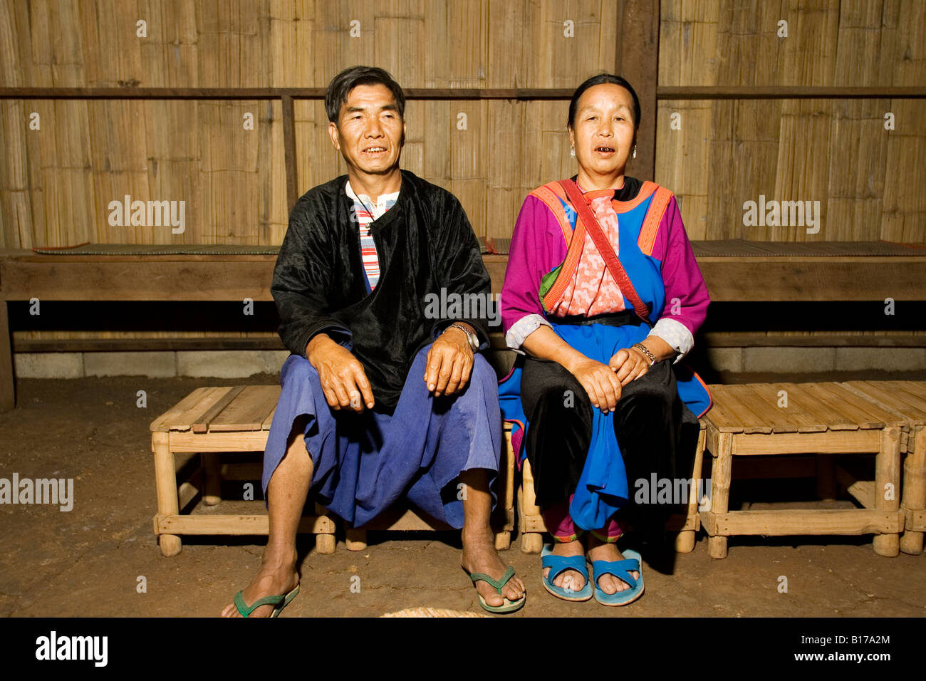a married couple from the Akha tribe in the village catering house ...