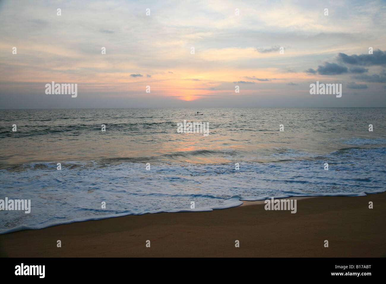 Sunset at kerala beach, india Stock Photo - Alamy