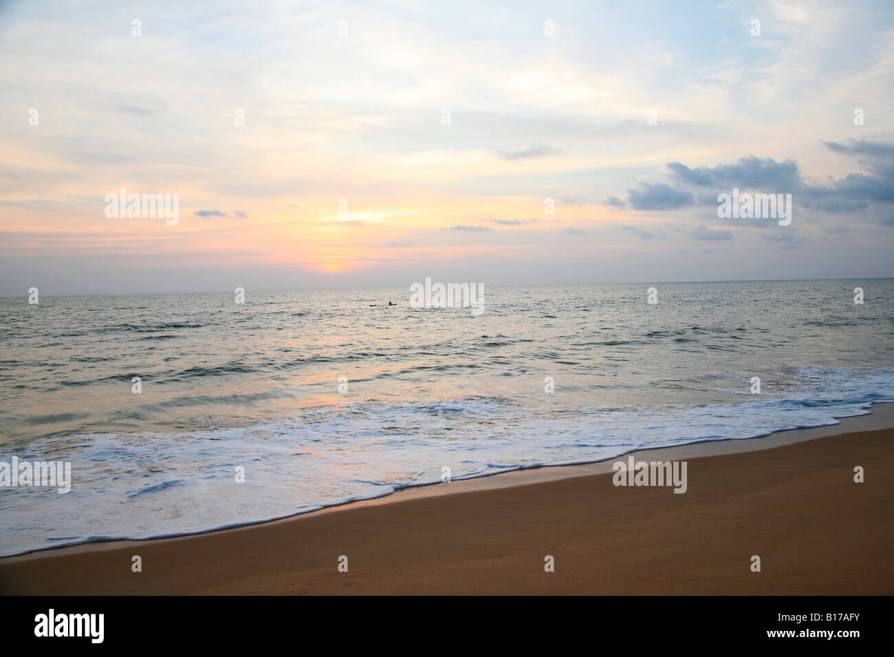 sunset view of a kerala beach Stock Photo - Alamy
