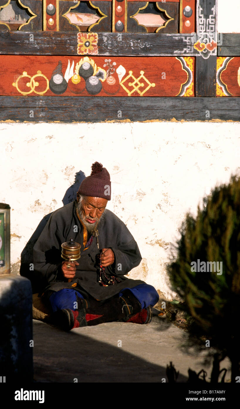 Bhutan Jakar Bumthang Valley Tamzhing Monastery man praying Stock Photo ...