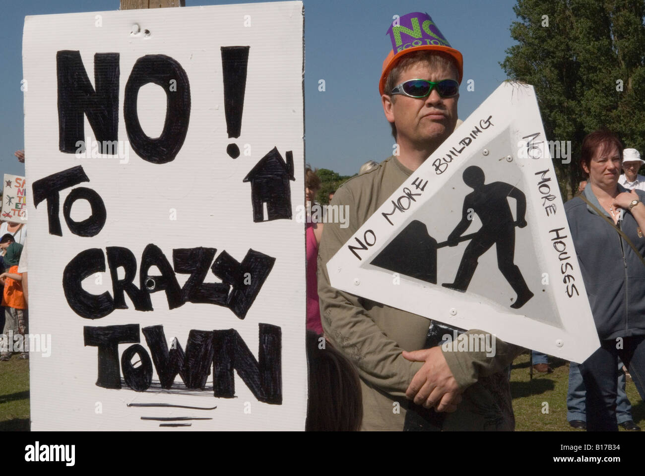 Village community brought together to protest against proposed new town ...