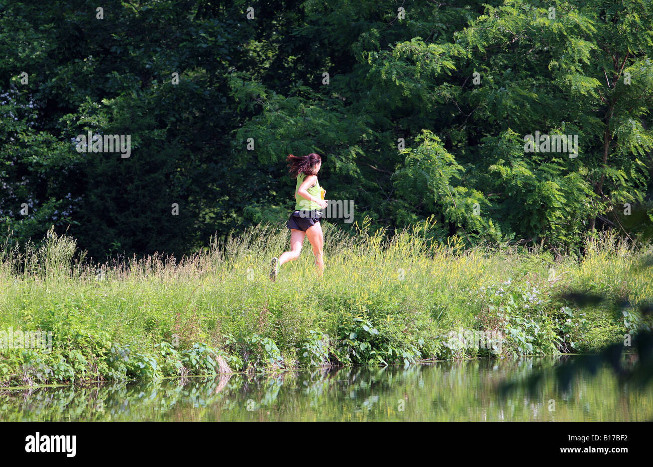 Lone Female Runner High Resolution Stock Photography and Images - Alamy