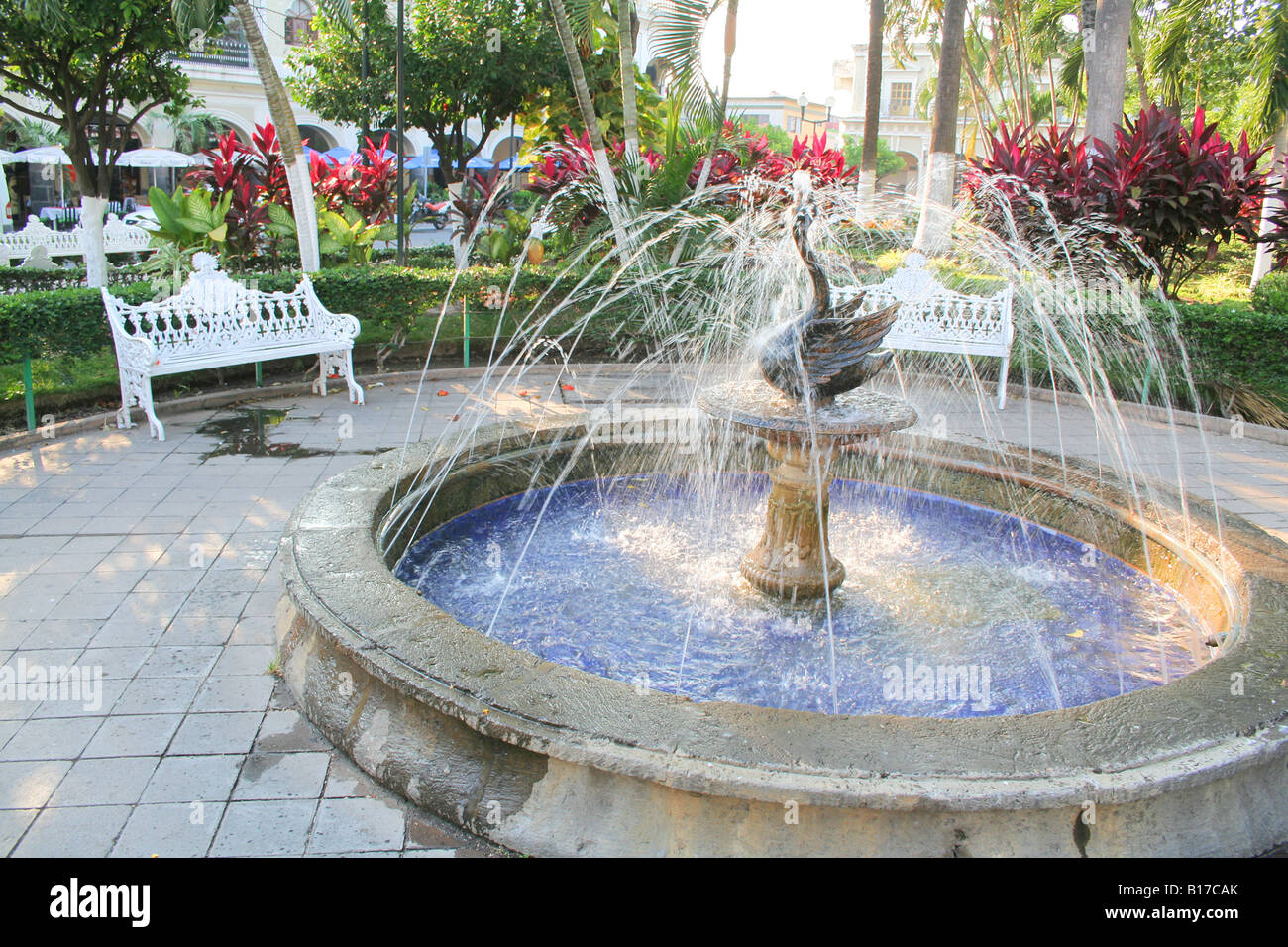 Park fountain with swan in Colima Mexico Stock Photo - Alamy
