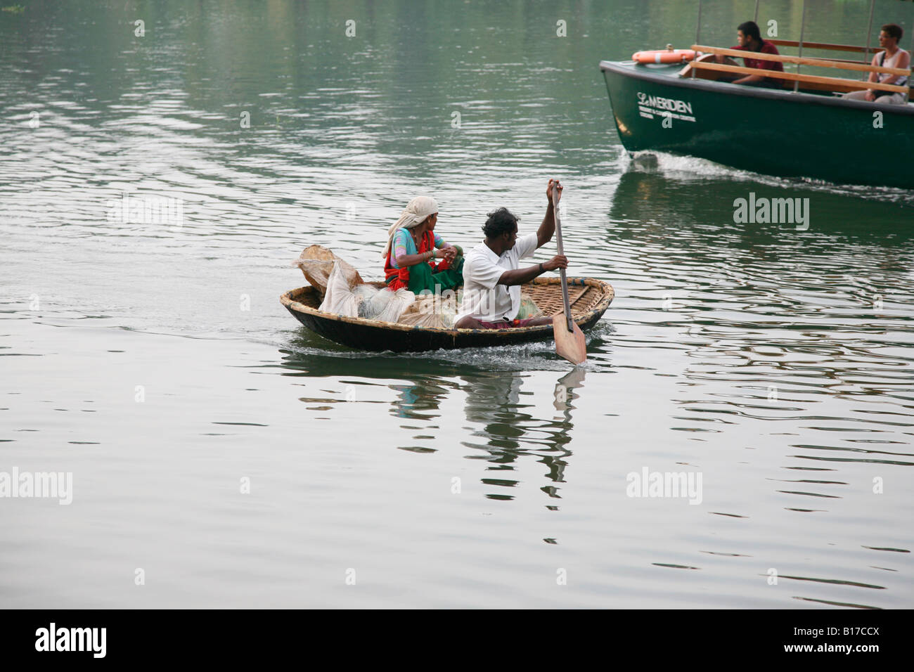 Wife and husband sailing a small country boat at kochi,kerala,india ...
