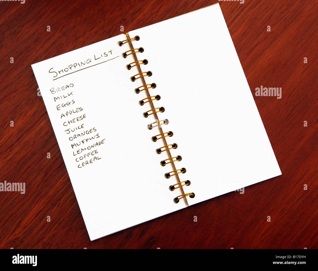 A shopping list written in a notebook Stock Photo - Alamy