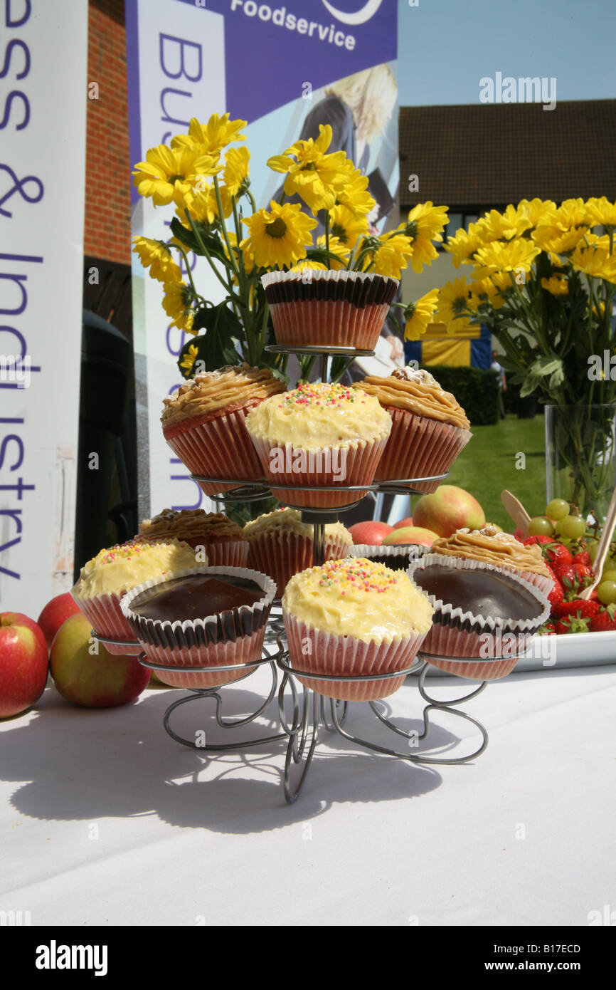 Cup cakes on display at a food fair Stock Photo - Alamy