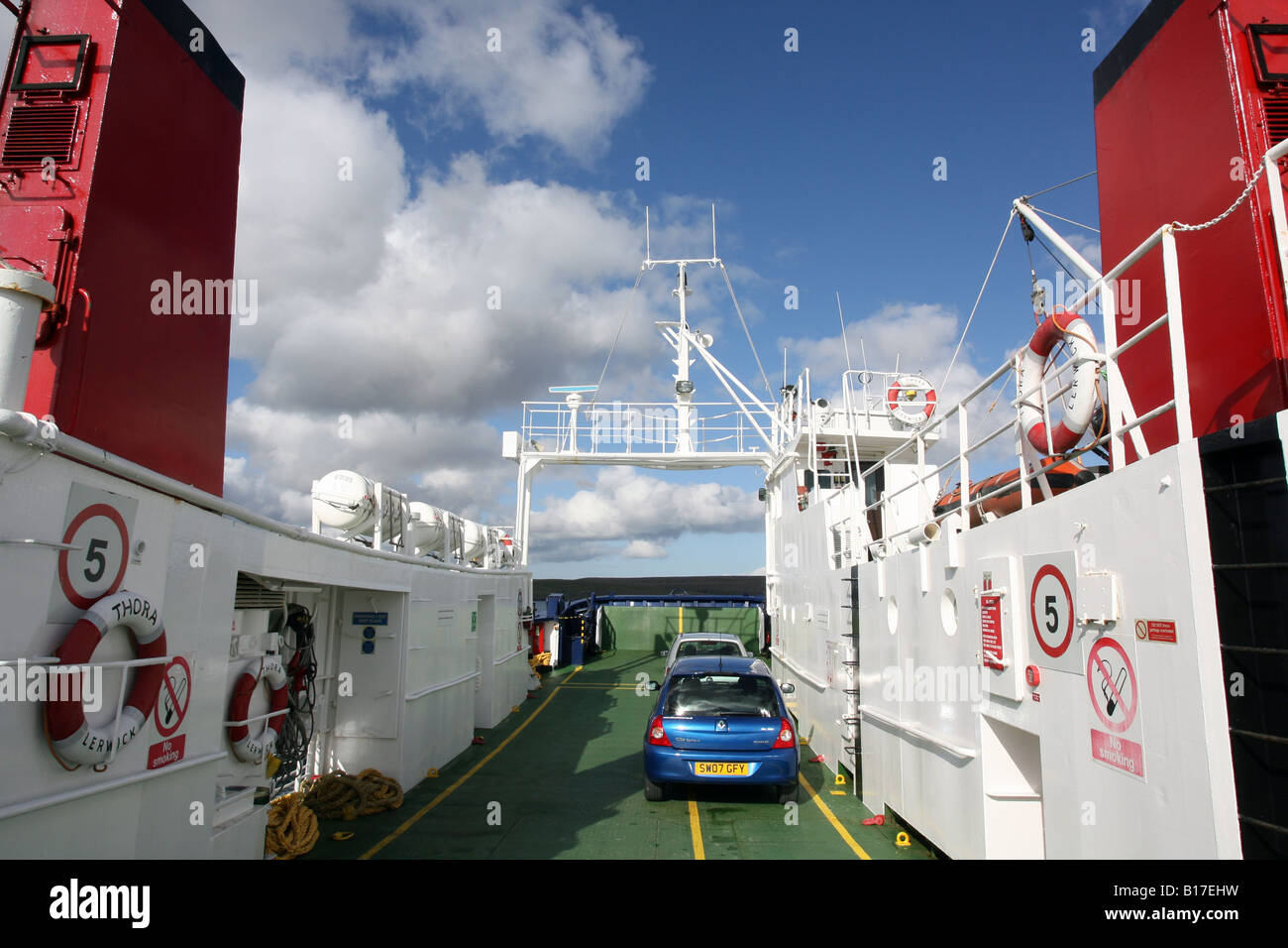 The ferry Thora sailing between the islands of Yell and Unst in the ...