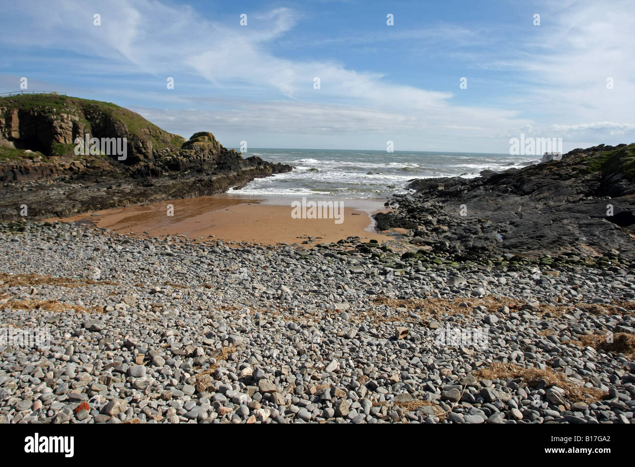 The small shingle and sand beach at the former fishing village of ...