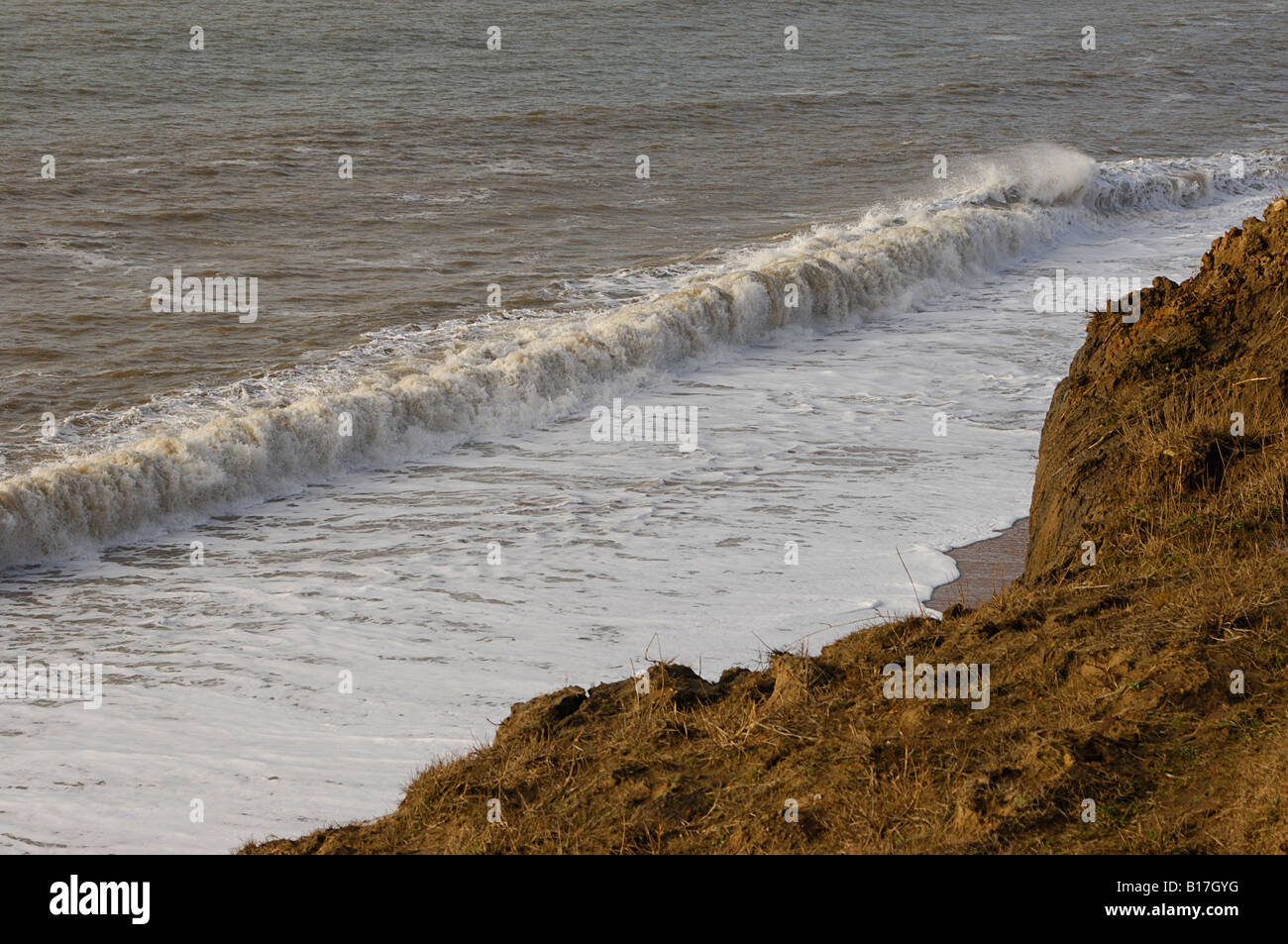 A wave washes towards the coast running parallel to it, demonstrating ...