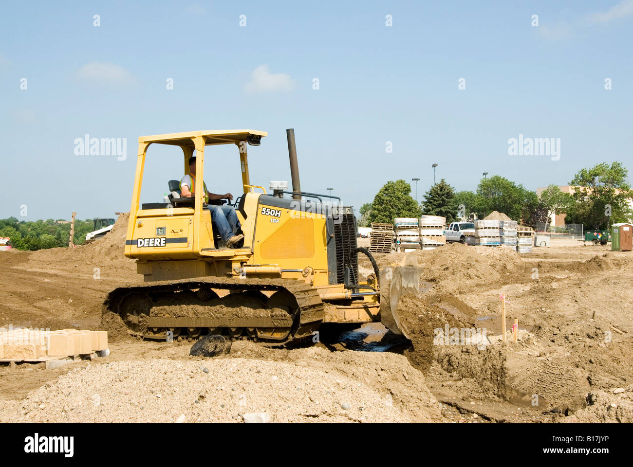 earthmoving equipment at work on a consturction site Stock Photo - Alamy