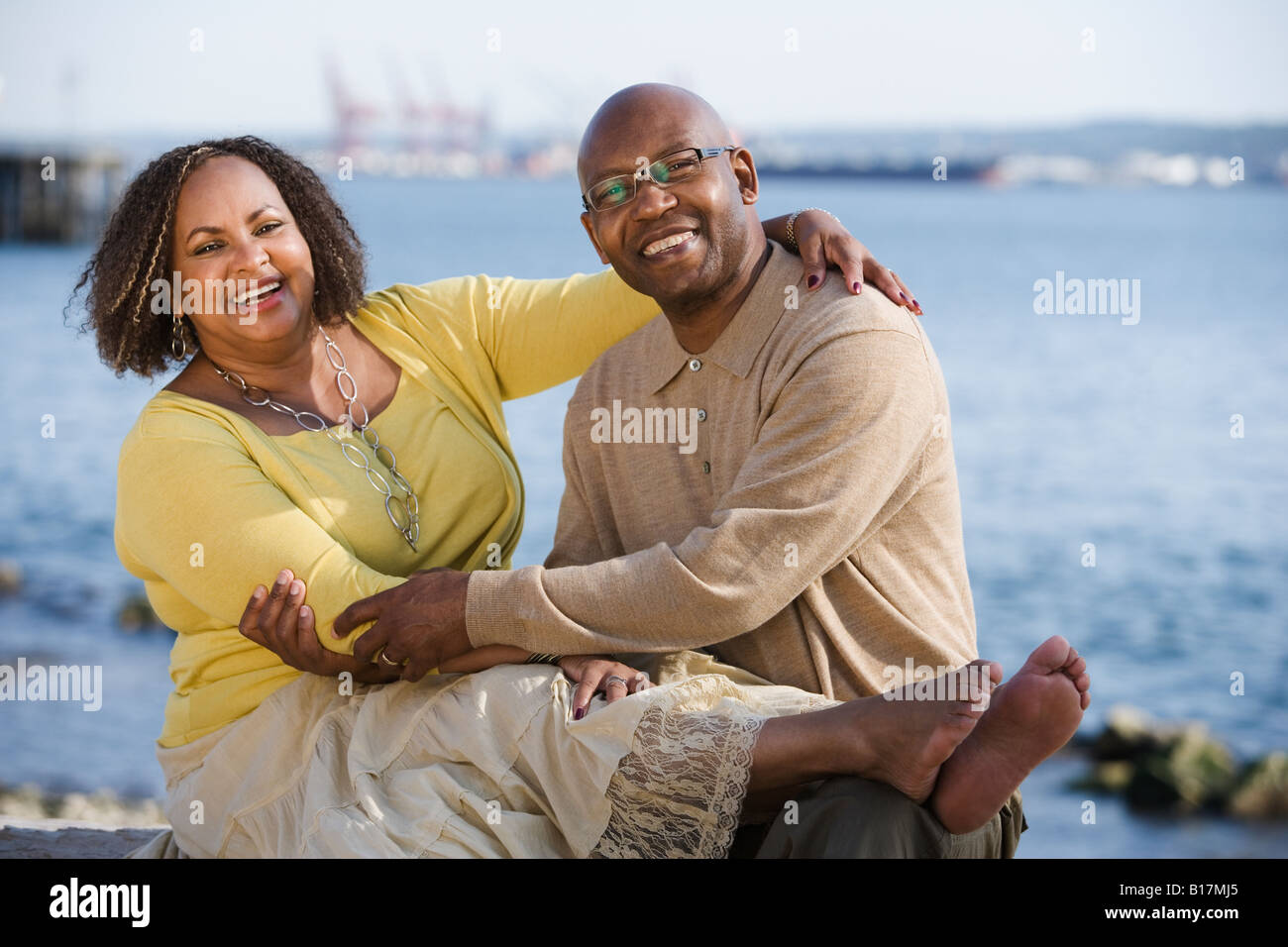African American couple hugging Stock Photo - Alamy
