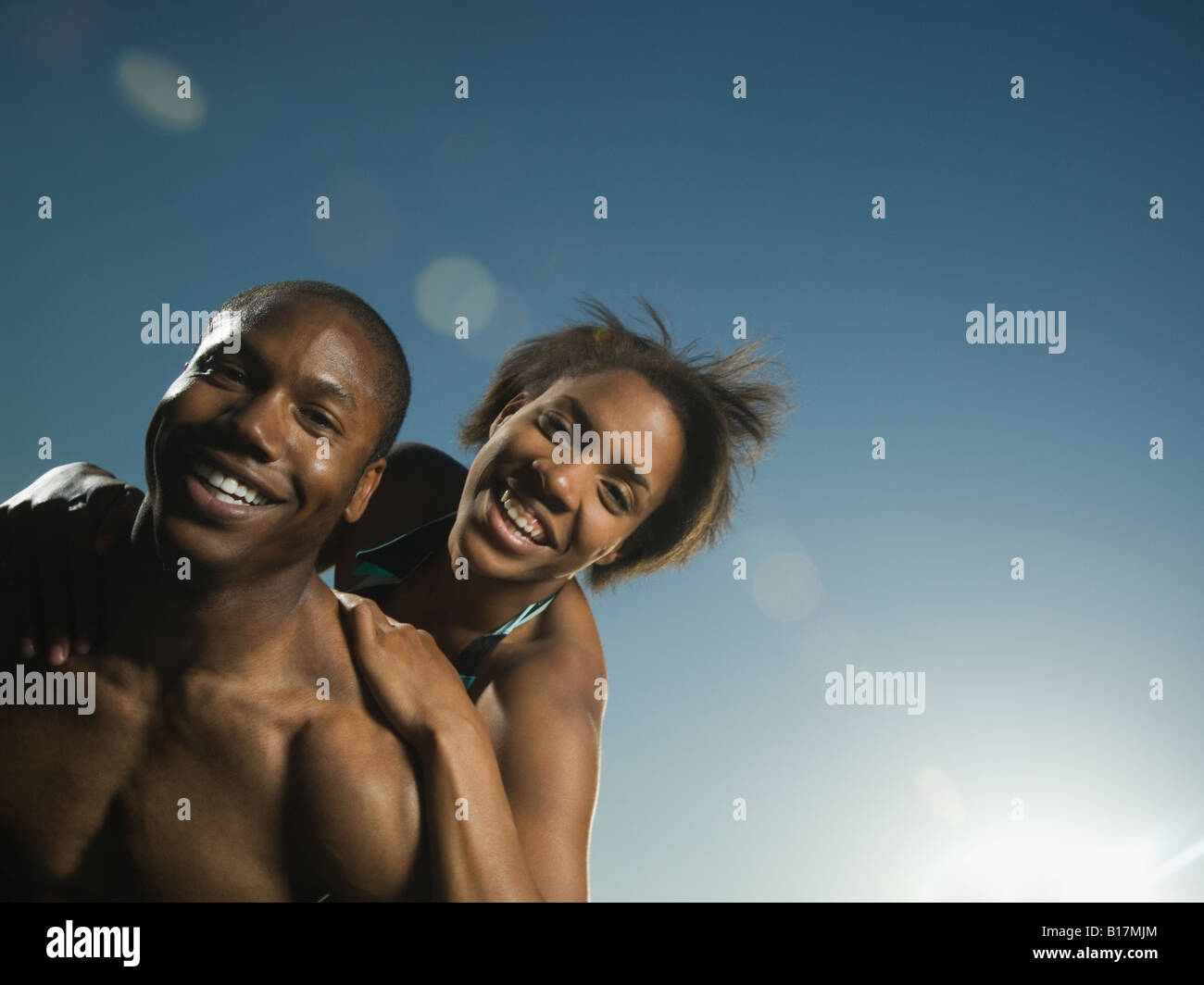 African American couple hugging Stock Photo - Alamy