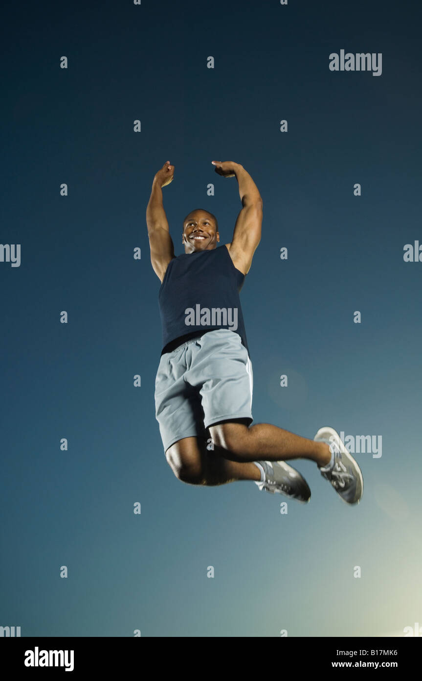 African American man jumping Stock Photo - Alamy