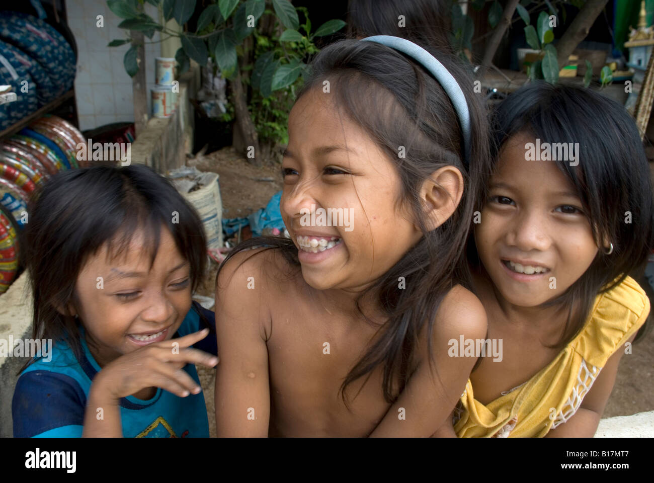 Cambodia kids at roadside hawker stall Stock Photo - Alamy