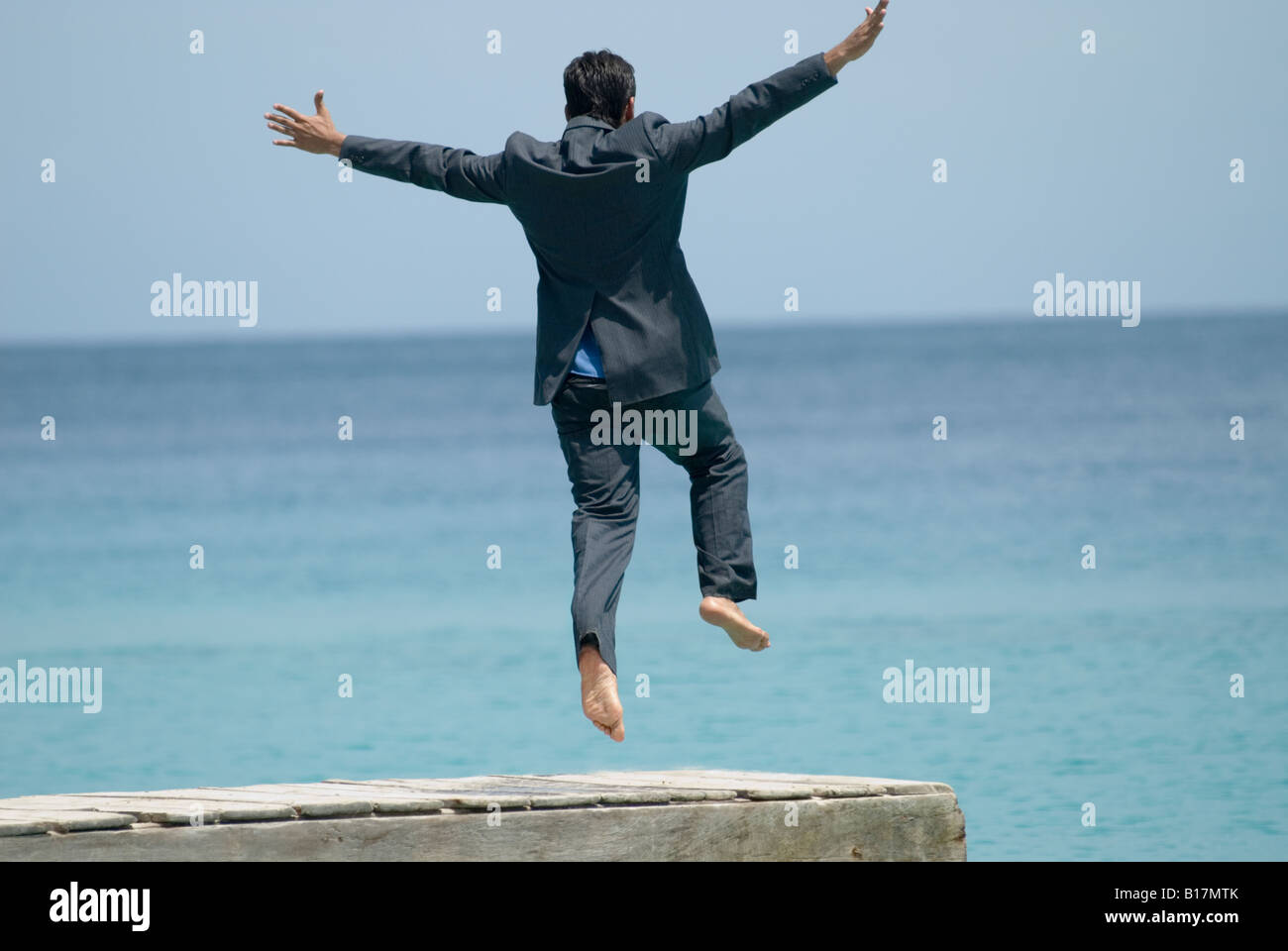 Jumping off dock hi-res stock photography and images - Alamy