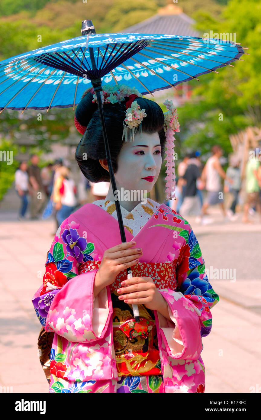 maiko apprentice geisha with umbrella at Kiyomizu Temple Kyoto Japan ...