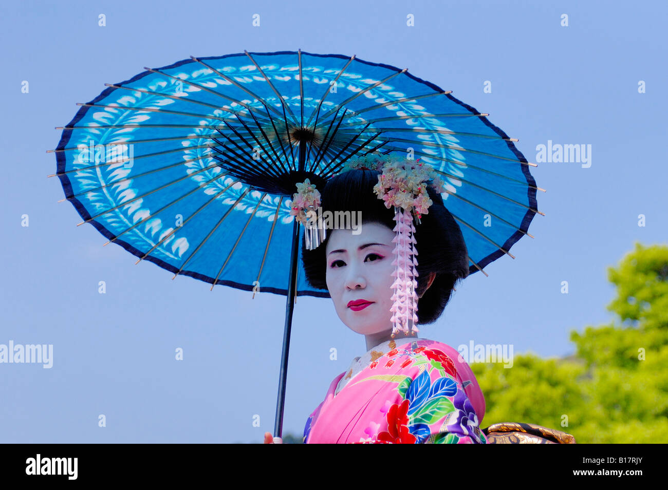 maiko apprentice geisha with umbrella at Kiyomizu Temple Kyoto Japan ...