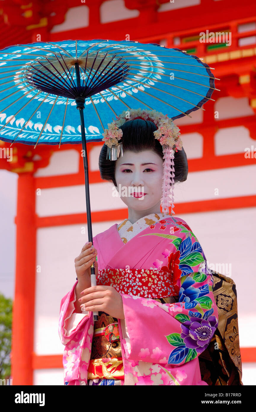 maiko apprentice geisha with umbrella at Kiyomizu Temple Kyoto Japan ...