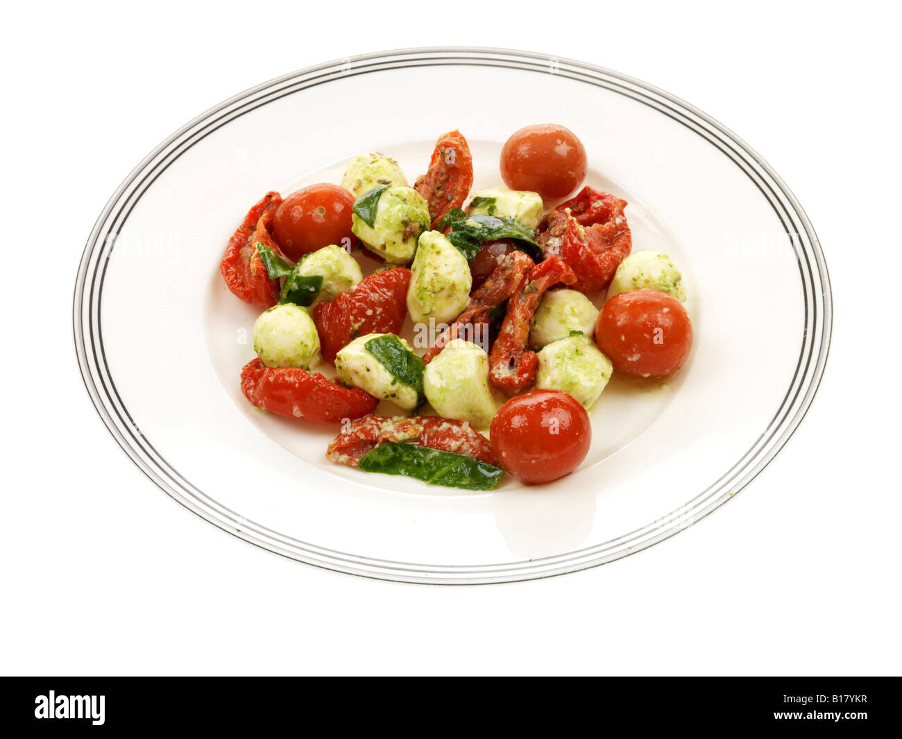 Mozzarella and Sunblush Tomato Salad Stock Photo - Alamy