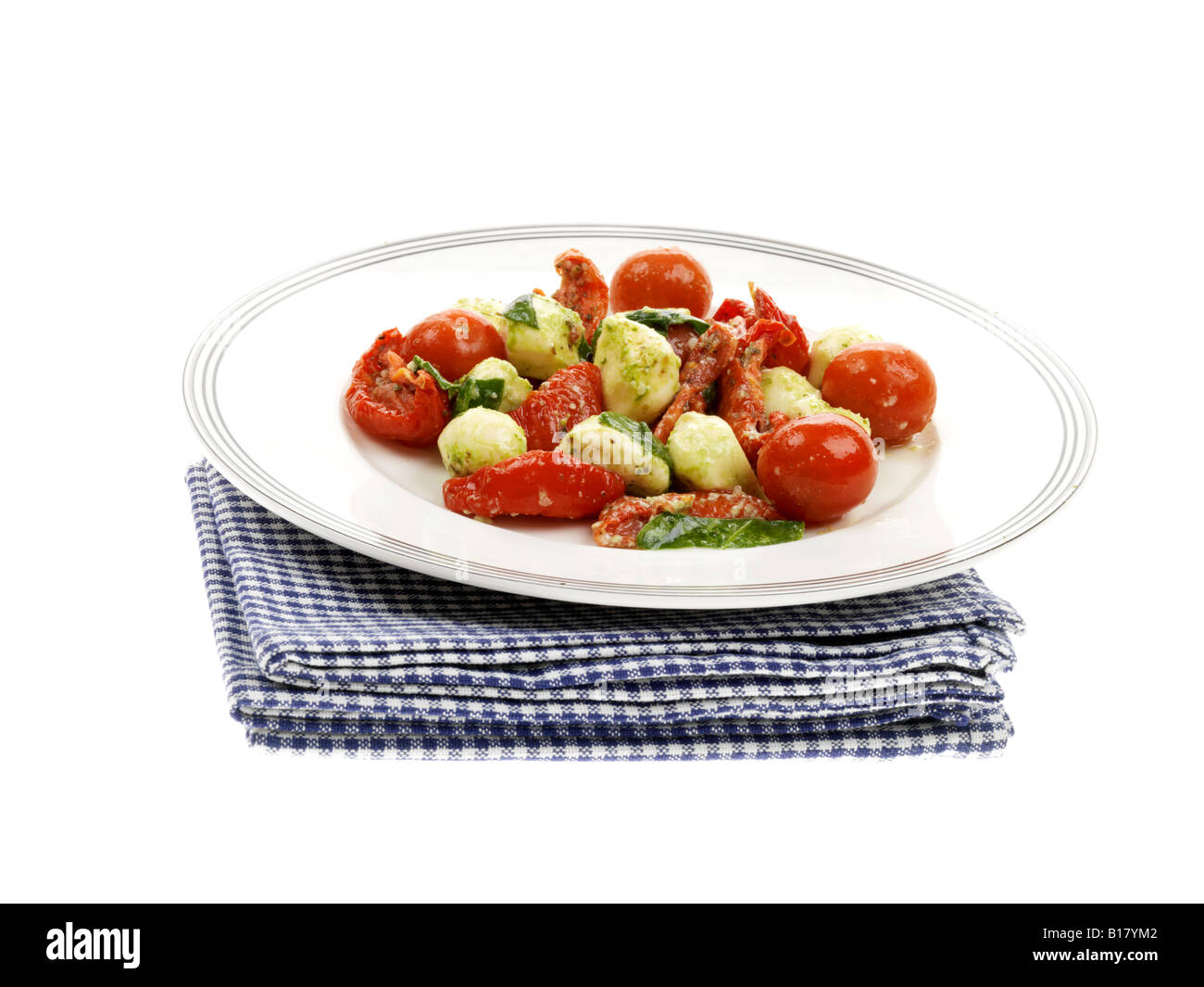 Mozzarella and Sunblush Tomato Salad Stock Photo - Alamy