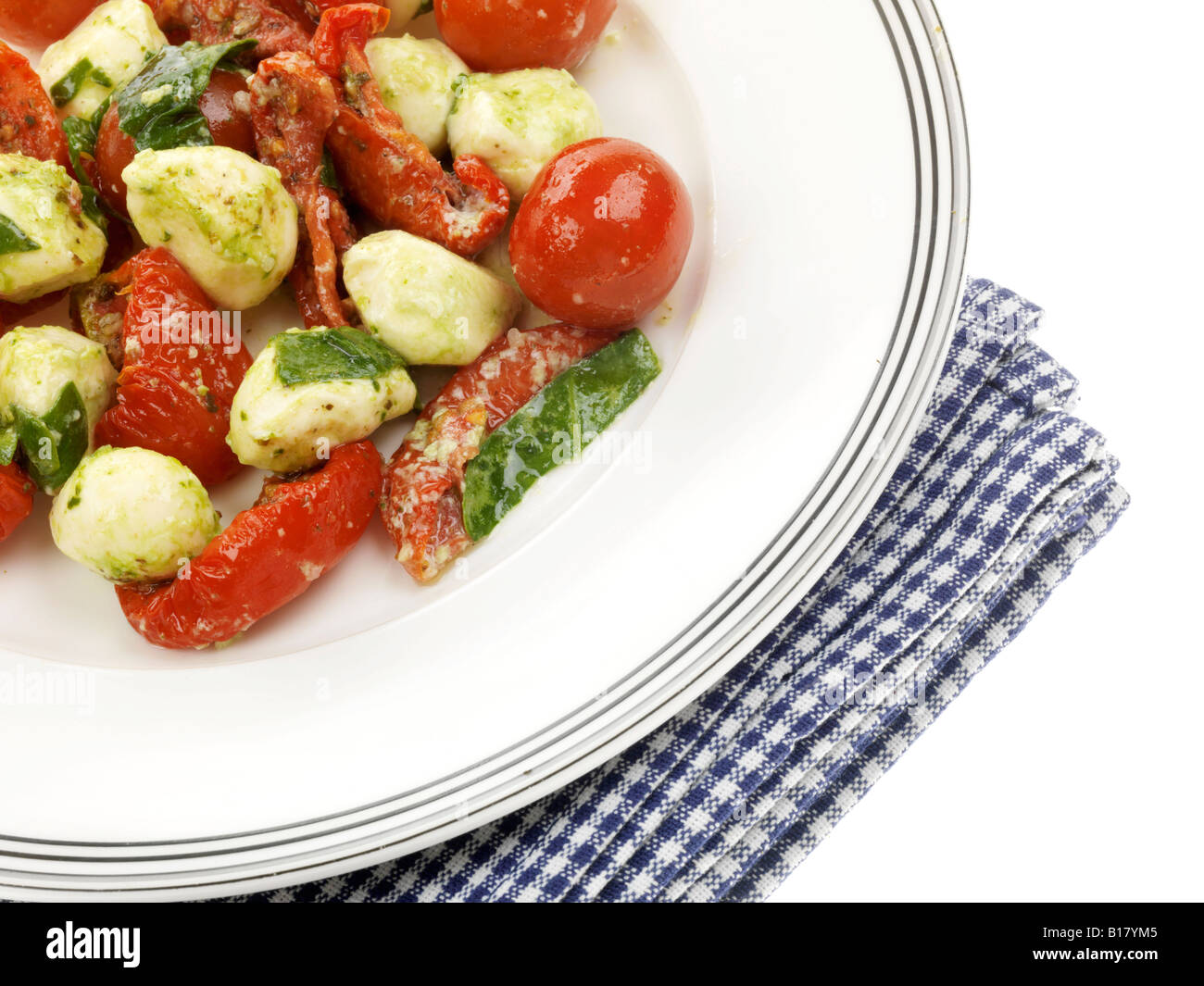 Mozzarella and Sunblush Tomato Salad Stock Photo - Alamy
