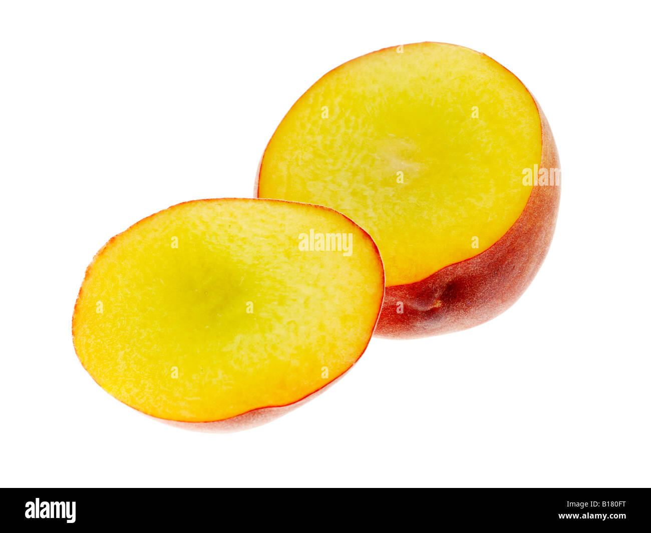 Halved peach hi-res stock photography and images - Alamy