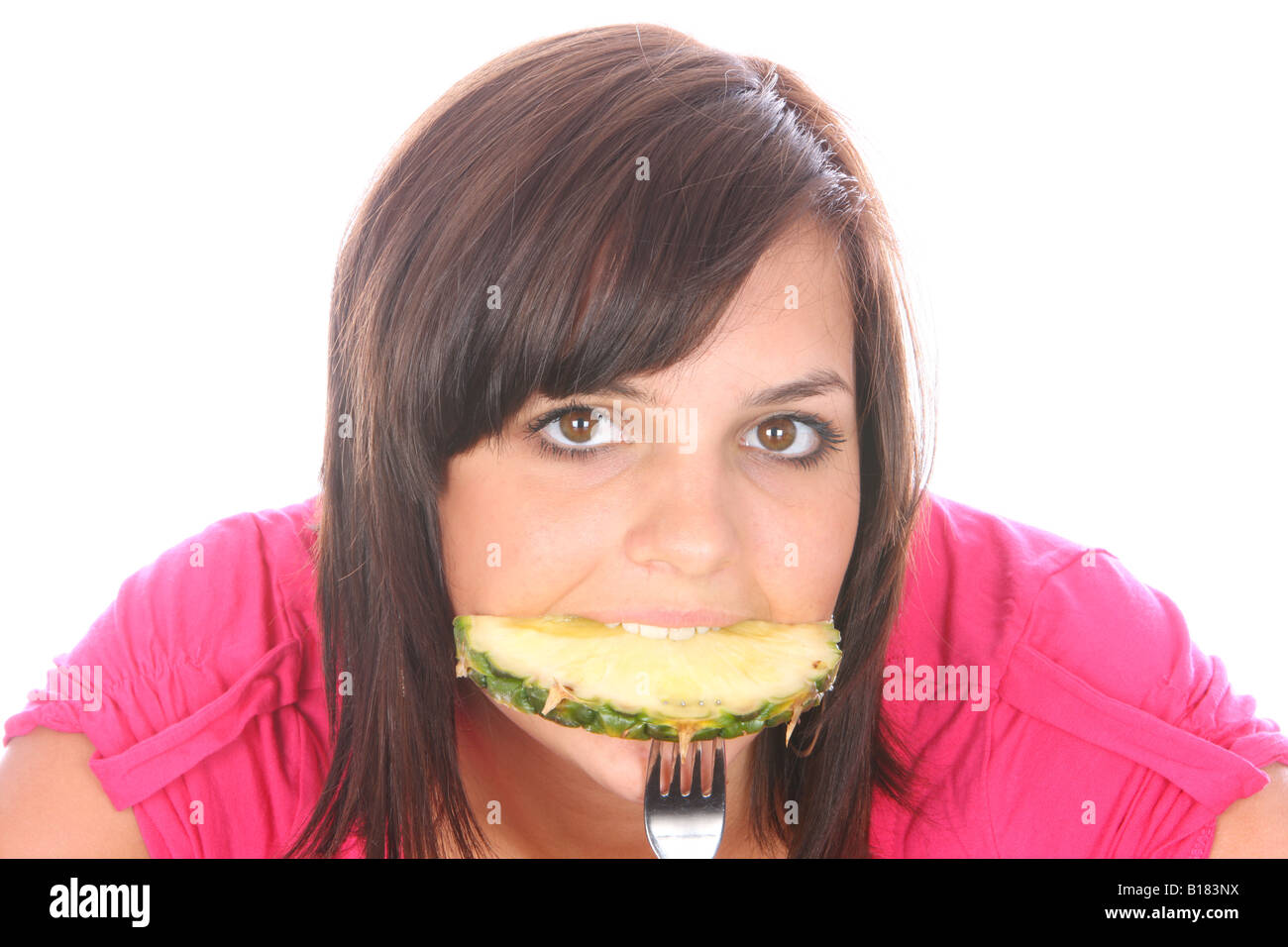 Young Woman Eating Pineapples Model Released Stock Photo - Alamy