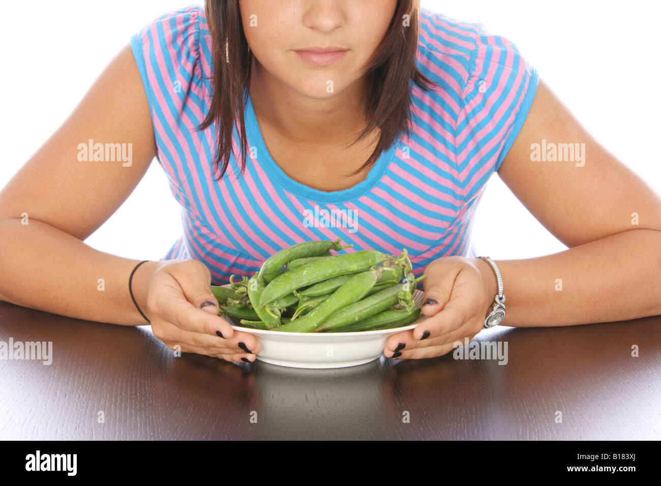 Young Woman Holding a Plate of Fresh Garden Peas Model Released Stock ...